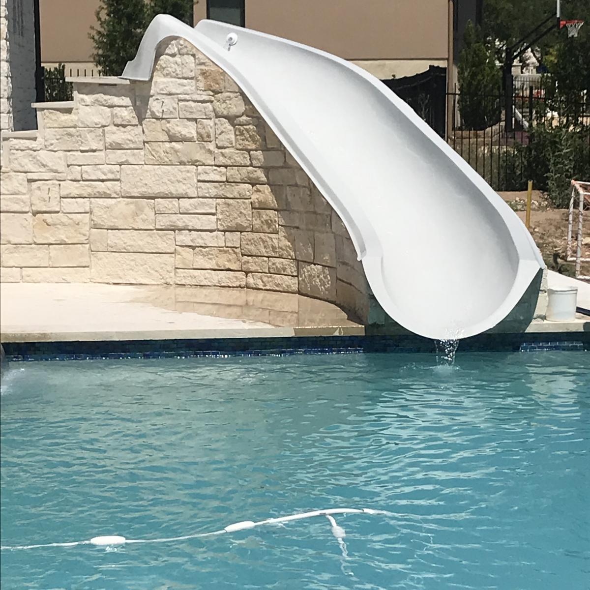 5 Ways Custom Pool Slides Add Value to Your Home - Dolphin Waterslides