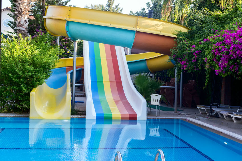 Choosing the Right Pool Slide for Your Landscape Design - Dolphin ...