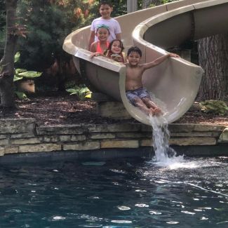 Custom Pool Slides & Fiberglass Residential Water Slides at Dolphin Waterslides